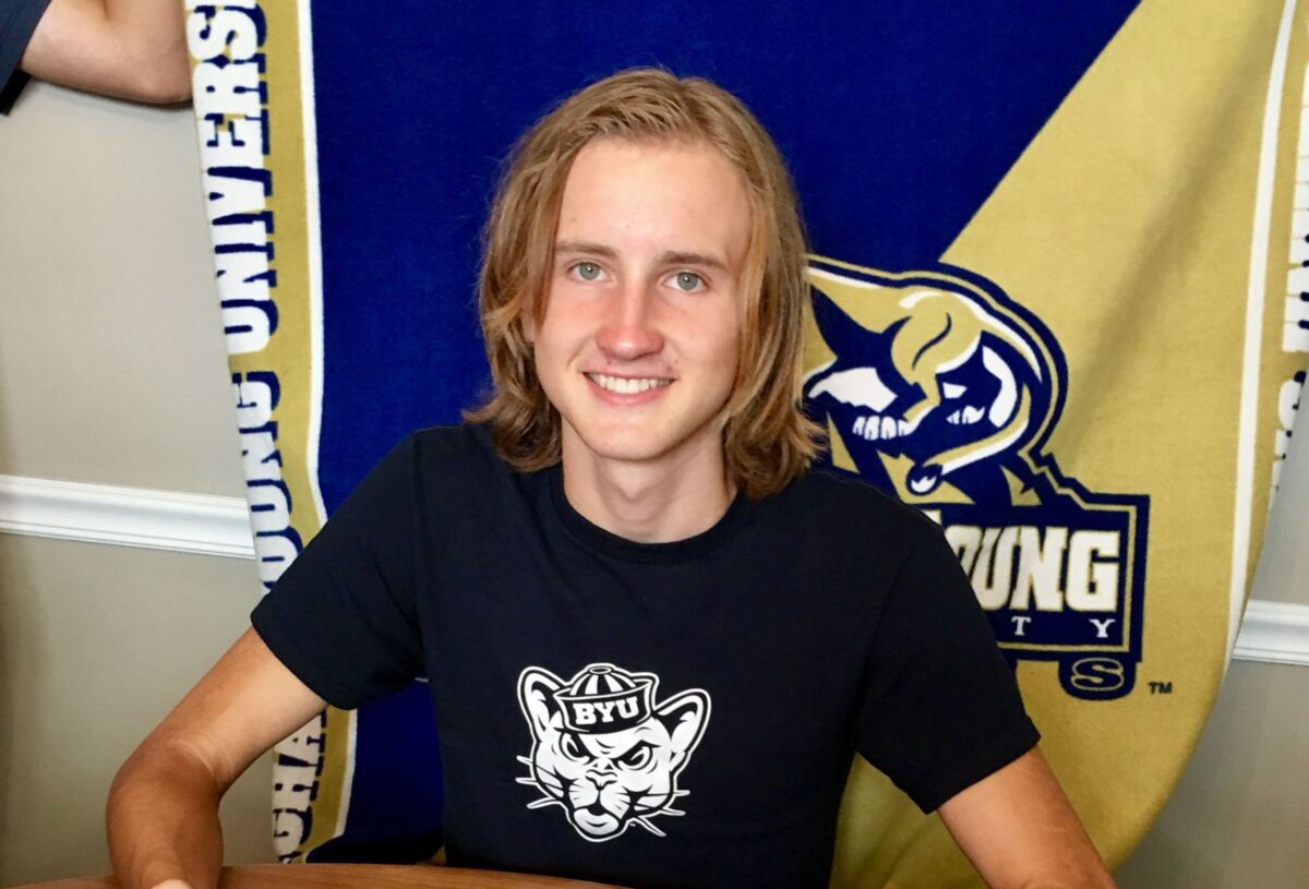Ogden High product Garrett Barton signs to run track and cross country ...